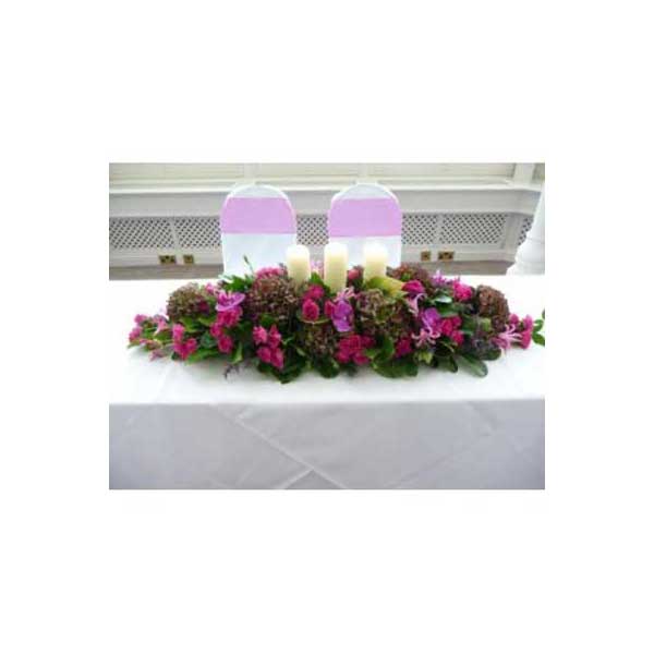 Pink Top Table Arrangement - Bloxhams Florists